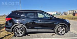 Melns Hyundai Santa Fe 2013 Rīga, ar dzinēja tilpumu 2.20 L un nobraukumu 242 tūkst. km par 8900 €, foto 3 vietnē AUTOMOTO.COM.LV