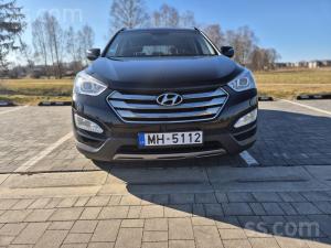 Melns Hyundai Santa Fe 2013 Rīga, ar dzinēja tilpumu 2.20 L un nobraukumu 242 tūkst. km par 8900 €, foto 4 vietnē AUTOMOTO.COM.LV