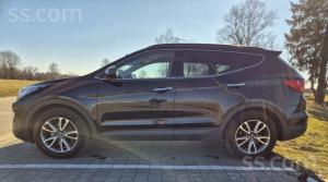 Melns Hyundai Santa Fe 2013 Rīga, ar dzinēja tilpumu 2.20 L un nobraukumu 242 tūkst. km par 8900 €, foto 6 vietnē AUTOMOTO.COM.LV
