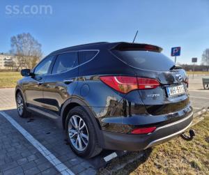 Melns Hyundai Santa Fe 2013 Rīga, ar dzinēja tilpumu 2.20 L un nobraukumu 242 tūkst. km par 8900 €, foto 7 vietnē AUTOMOTO.COM.LV