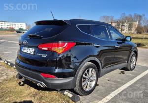 Melns Hyundai Santa Fe 2013 Rīga, ar dzinēja tilpumu 2.20 L un nobraukumu 242 tūkst. km par 8900 €, foto 8 vietnē AUTOMOTO.COM.LV