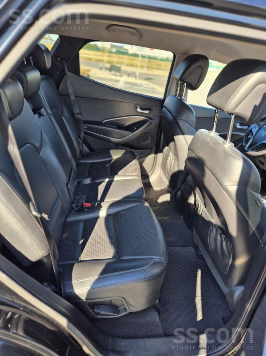 Melns Hyundai Santa Fe 2013 Rīga, ar dzinēja tilpumu 2.20 L un nobraukumu 242 tūkst. km par 8900 €, foto 12 vietnē AUTOMOTO.COM.LV