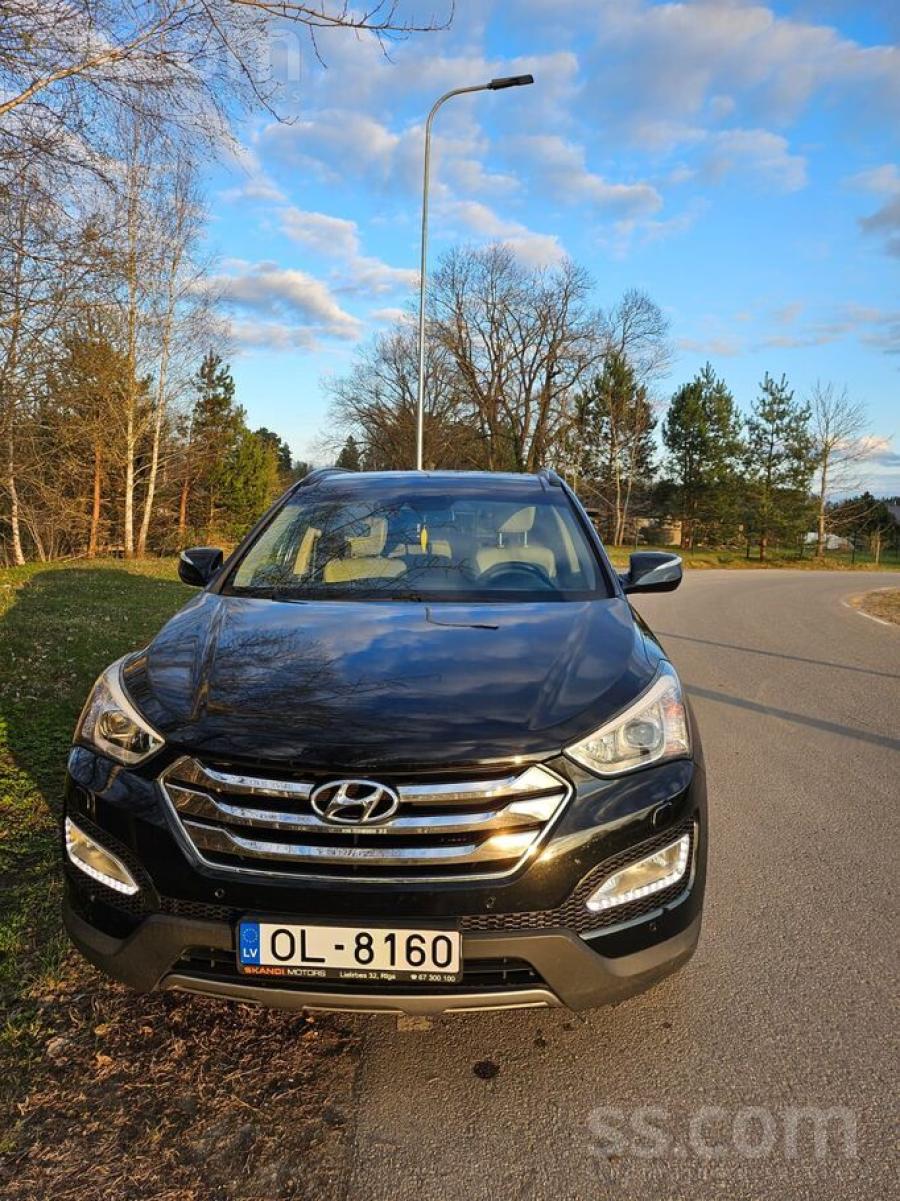 Melns Hyundai Santa Fe 2013 Rīga, ar dzinēja tilpumu 2.20 L un nobraukumu 243 tūkst. km par 9000 €, foto 1 vietnē AUTOMOTO.COM.LV