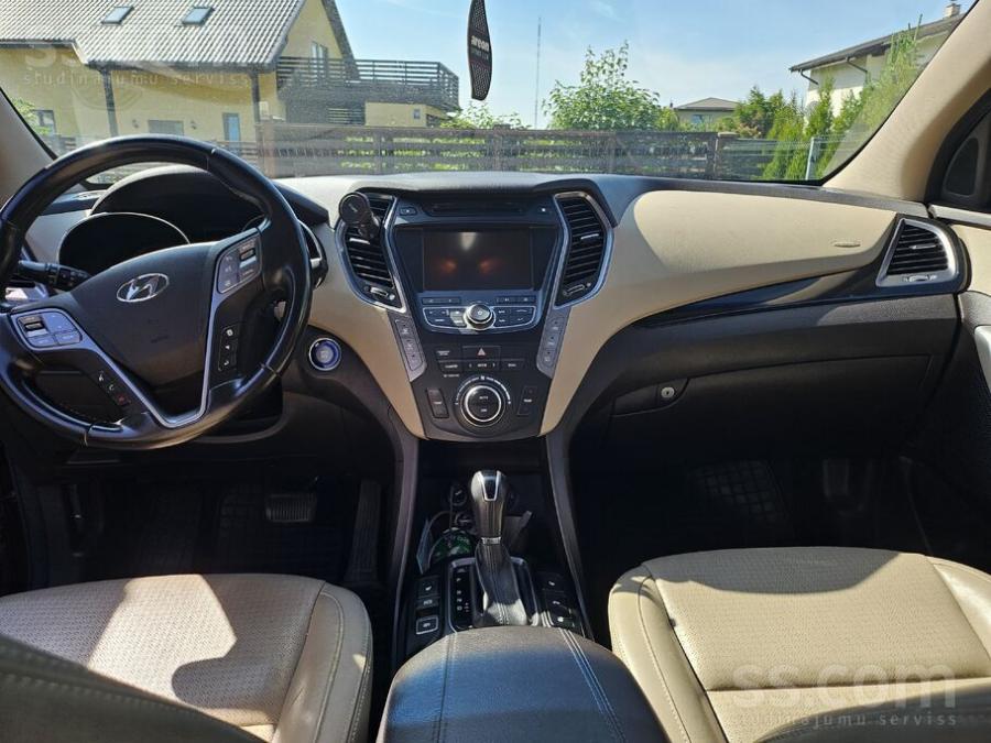 Melns Hyundai Santa Fe 2013 Rīga, ar dzinēja tilpumu 2.20 L un nobraukumu 243 tūkst. km par 9000 €, foto 3 vietnē AUTOMOTO.COM.LV
