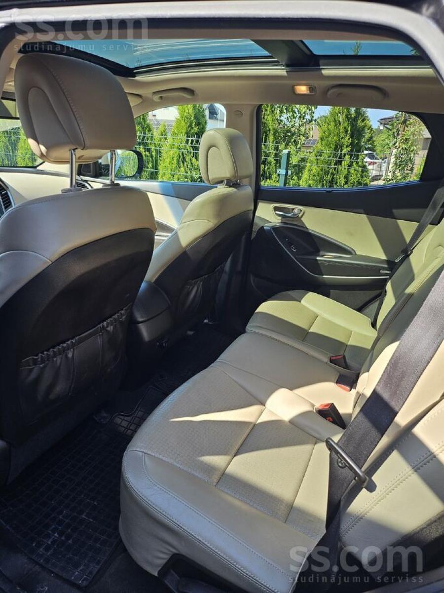 Melns Hyundai Santa Fe 2013 Rīga, ar dzinēja tilpumu 2.20 L un nobraukumu 243 tūkst. km par 9000 €, foto 5 vietnē AUTOMOTO.COM.LV