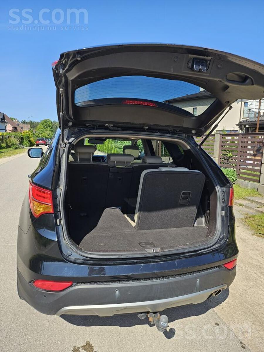 Melns Hyundai Santa Fe 2013 Rīga, ar dzinēja tilpumu 2.20 L un nobraukumu 243 tūkst. km par 9000 €, foto 8 vietnē AUTOMOTO.COM.LV