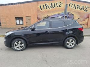 Melns Hyundai Santa Fe 2013 Rīga, ar dzinēja tilpumu 2.20 L un nobraukumu 0 tūkst. km par 7000 €, foto 4 vietnē AUTOMOTO.COM.LV