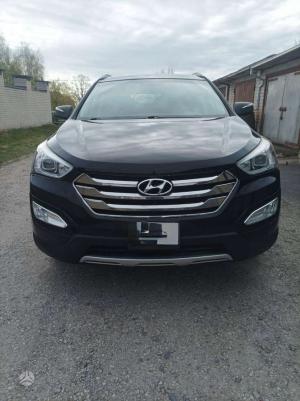 Black Hyundai Santa Fe 2013 in Marijampole, with an engine capacity of 2.36 L and mileage of 130 thousand km for 7900 €, photo  on AUTOMOTO.COM.LV
