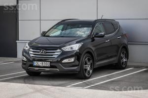 Black Hyundai Santa Fe 2013 in Riga, with an engine capacity of 2.20 L and mileage of 245 thousand km for 10990 €, photo  on AUTOMOTO.COM.LV