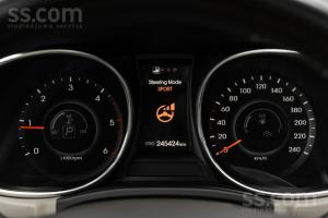 Black Hyundai Santa Fe 2013 in Riga, with an engine capacity of 2.20 L and mileage of 245 thousand km for 10990 €, photo 21 on AUTOMOTO.COM.LV