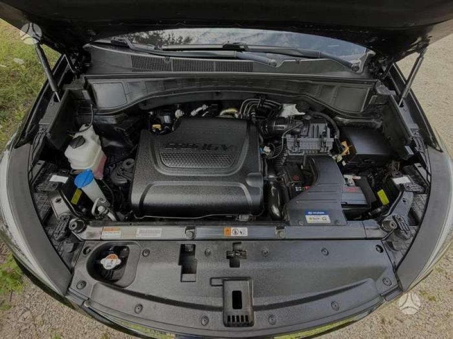 Black Hyundai Santa Fe 2013 in Siauliai, with an engine capacity of 2.20 L and mileage of 218 thousand km for 13650 €, photo 51 on AUTOMOTO.COM.LV