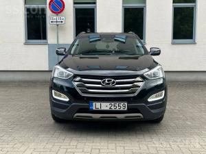 Melns Hyundai Santa Fe 2013 Jelgava, ar dzinēja tilpumu 2.20 L un nobraukumu 262 tūkst. km par 10800 €, foto  vietnē AUTOMOTO.COM.LV