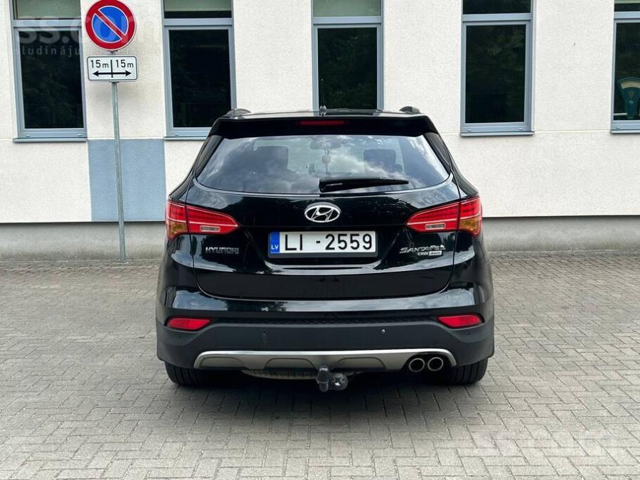 Melns Hyundai Santa Fe 2013 Jelgava, ar dzinēja tilpumu 2.20 L un nobraukumu 262 tūkst. km par 10800 €, foto 5 vietnē AUTOMOTO.COM.LV