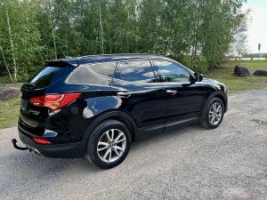 Melns Hyundai Santa Fe 2013 Biržai, ar dzinēja tilpumu 2.20 L un nobraukumu 259 tūkst. km par 8900 €, foto 14 vietnē AUTOMOTO.COM.LV