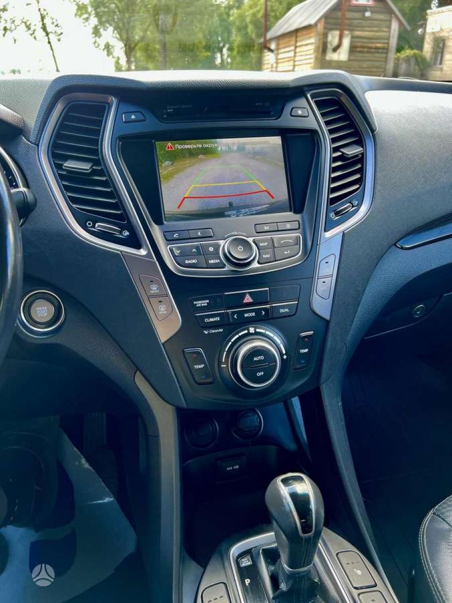 Melns Hyundai Santa Fe 2013 Biržai, ar dzinēja tilpumu 2.20 L un nobraukumu 259 tūkst. km par 8900 €, foto 15 vietnē AUTOMOTO.COM.LV