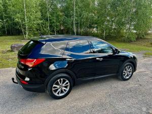 Melns Hyundai Santa Fe 2013 Biržai, ar dzinēja tilpumu 2.20 L un nobraukumu 259 tūkst. km par 8900 €, foto 22 vietnē AUTOMOTO.COM.LV