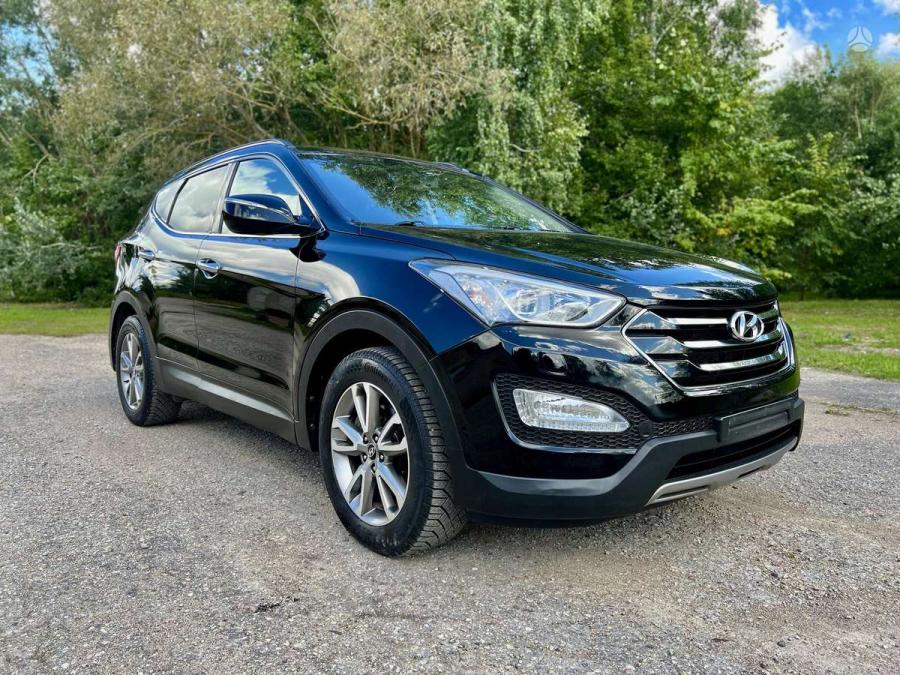 Melns Hyundai Santa Fe 2013 Biržai, ar dzinēja tilpumu 2.20 L un nobraukumu 259 tūkst. km par 8900 €, foto 24 vietnē AUTOMOTO.COM.LV