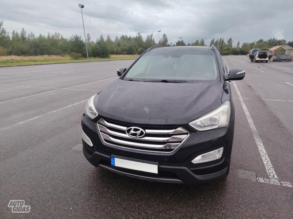 Hyundai Santa Fe 2013 Viļņa vietnē Melns Hyundai Santa Fe 2013 Viļņa, ar dzinēja tilpumu 2.20 L un nobraukumu 276 tūkst. km par 7750 €, foto 3 vietnē AUTOMOTO.COM.LV