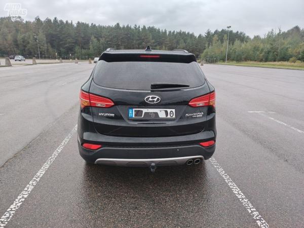 Hyundai Santa Fe 2013 Viļņa vietnē Melns Hyundai Santa Fe 2013 Viļņa, ar dzinēja tilpumu 2.20 L un nobraukumu 276 tūkst. km par 7750 €, foto 4 vietnē AUTOMOTO.COM.LV