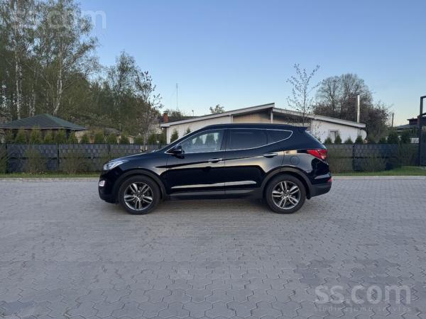 Melns Hyundai Santa Fe 2014 Rīga, ar dzinēja tilpumu 2.20 L un nobraukumu 214 tūkst. km par 11500 €, foto 5 vietnē AUTOMOTO.COM.LV