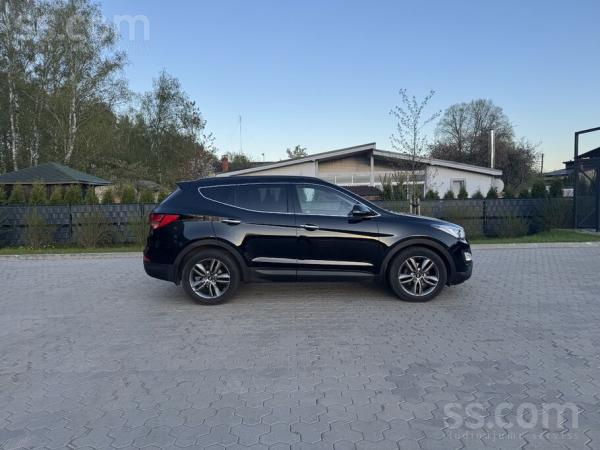Melns Hyundai Santa Fe 2014 Rīga, ar dzinēja tilpumu 2.20 L un nobraukumu 214 tūkst. km par 11500 €, foto 6 vietnē AUTOMOTO.COM.LV