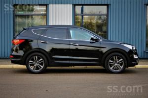 Melns Hyundai Santa Fe 2014 Rīga, ar dzinēja tilpumu 2.20 L un nobraukumu 250 tūkst. km par 12990 €, foto 6 vietnē AUTOMOTO.COM.LV