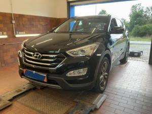 Black Hyundai Santa Fe 2014 in Riga, with an engine capacity of 2.20 L and mileage of 250 thousand km for 13800 €, photo  on AUTOMOTO.COM.LV