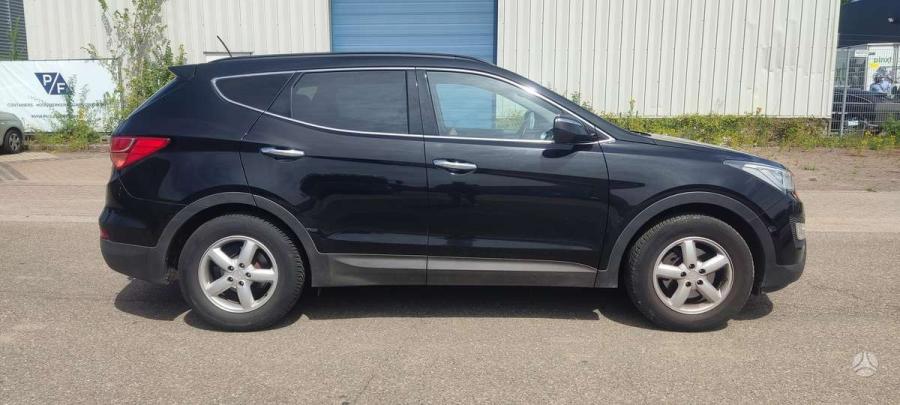 Melns Hyundai Santa Fe 2014 Kauņa, ar dzinēja tilpumu 2.20 L un nobraukumu 251 tūkst. km par 8600 €, foto 6 vietnē AUTOMOTO.COM.LV