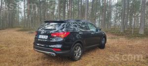 Black Hyundai Santa Fe 2014 in Rezekne, with an engine capacity of 2.20 L and mileage of 271 thousand km for 9300 €, photo 4 on AUTOMOTO.COM.LV