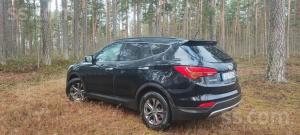 Black Hyundai Santa Fe 2014 in Rezekne, with an engine capacity of 2.20 L and mileage of 271 thousand km for 9300 €, photo 5 on AUTOMOTO.COM.LV