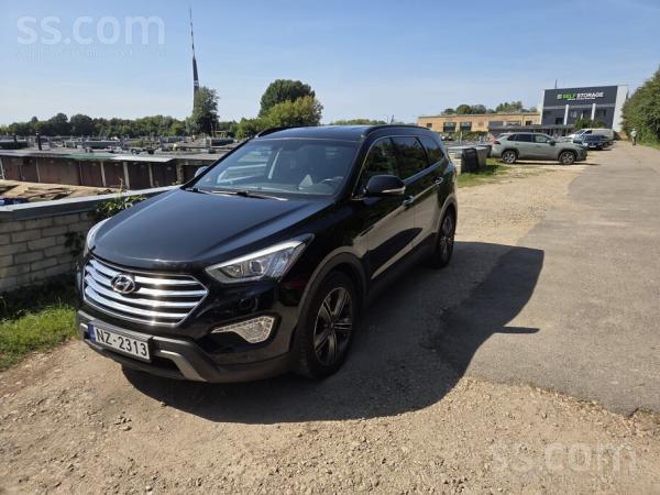 Melns Hyundai Santa Fe 2014 Rīga, ar dzinēja tilpumu 2.20 L un nobraukumu 229 tūkst. km par 12000 €, foto 1 vietnē AUTOMOTO.COM.LV