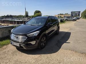 Melns Hyundai Santa Fe 2014 Rīga, ar dzinēja tilpumu 2.20 L un nobraukumu 229 tūkst. km par 12000 €, foto  vietnē AUTOMOTO.COM.LV