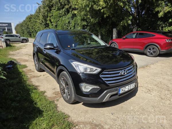 Melns Hyundai Santa Fe 2014 Rīga, ar dzinēja tilpumu 2.20 L un nobraukumu 229 tūkst. km par 12000 €, foto 2 vietnē AUTOMOTO.COM.LV