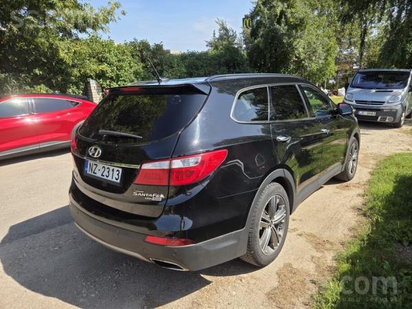 Melns Hyundai Santa Fe 2014 Rīga, ar dzinēja tilpumu 2.20 L un nobraukumu 229 tūkst. km par 12000 €, foto 4 vietnē AUTOMOTO.COM.LV
