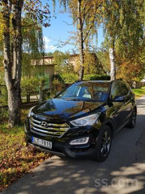 Melns Hyundai Santa Fe 2014 Rīga, ar dzinēja tilpumu 2.20 L un nobraukumu 189 tūkst. km par 8800 €, foto  vietnē AUTOMOTO.COM.LV