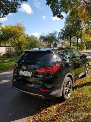 Melns Hyundai Santa Fe 2014 Rīga, ar dzinēja tilpumu 2.20 L un nobraukumu 189 tūkst. km par 8800 €, foto 3 vietnē AUTOMOTO.COM.LV