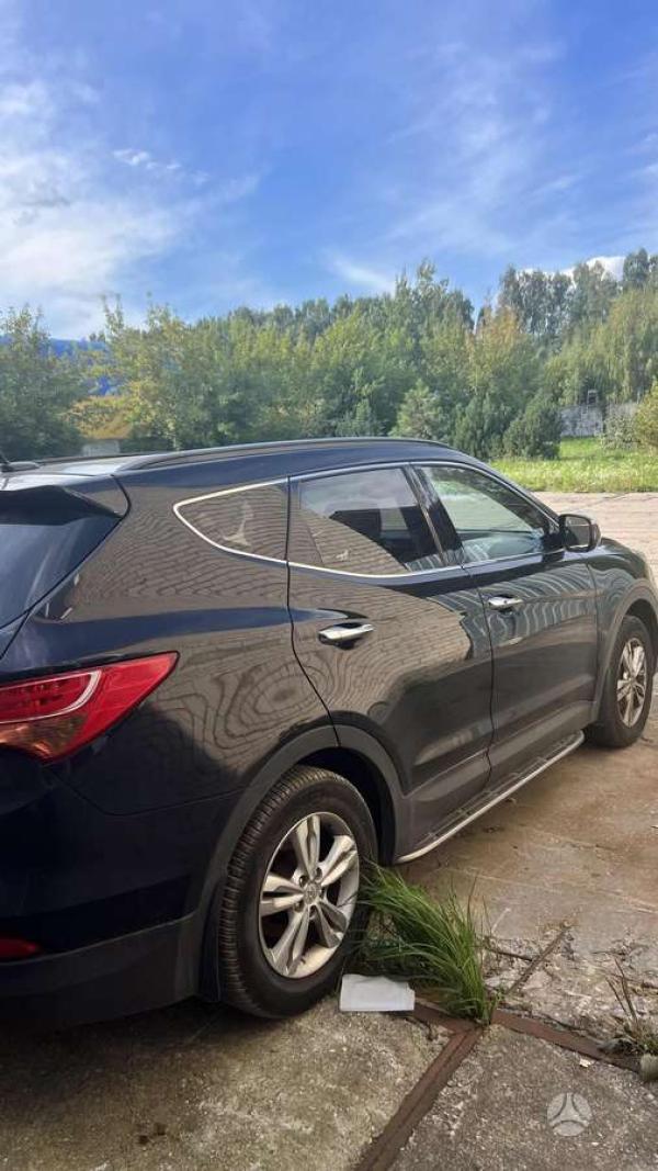 Melns Hyundai Santa Fe 2014 Panevēža, ar dzinēja tilpumu 2.20 L un nobraukumu 303 tūkst. km par 6499 €, foto 5 vietnē AUTOMOTO.COM.LV