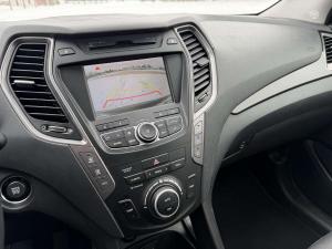 Black Hyundai Santa Fe 2015 in Taurage, with an engine capacity of 2.20 L and mileage of 196 thousand km for 11500 €, photo 11 on AUTOMOTO.COM.LV