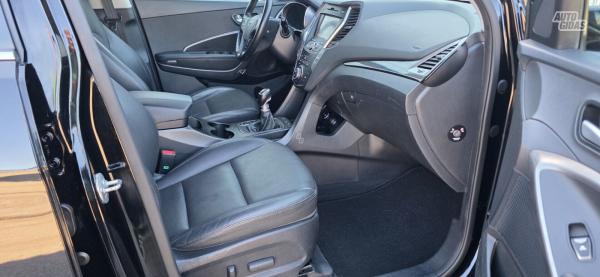 Melns Hyundai Santa Fe 2015 Šauļi, ar dzinēja tilpumu 2.00 L un nobraukumu 194 tūkst. km par 10650 €, foto 6 vietnē AUTOMOTO.COM.LV