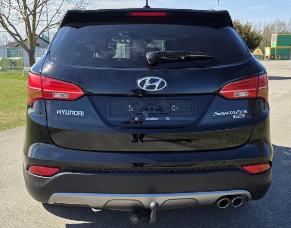 Melns Hyundai Santa Fe 2015 Šauļi, ar dzinēja tilpumu 2.00 L un nobraukumu 194 tūkst. km par 10650 €, foto 7 vietnē AUTOMOTO.COM.LV