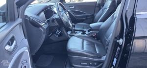 Black Hyundai Santa Fe 2015 in Siauliai, with an engine capacity of 2.00 L and mileage of 194 thousand km for 10650 €, photo 18 on AUTOMOTO.COM.LV