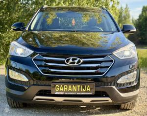 Black Hyundai Santa Fe 2015 in Siauliai, with an engine capacity of 2.20 L and mileage of 192 thousand km for 14999 €, photo 6 on AUTOMOTO.COM.LV