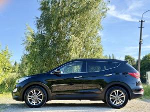 Black Hyundai Santa Fe 2015 in Siauliai, with an engine capacity of 2.20 L and mileage of 192 thousand km for 14999 €, photo 14 on AUTOMOTO.COM.LV