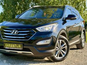 Black Hyundai Santa Fe 2015 in Siauliai, with an engine capacity of 2.20 L and mileage of 192 thousand km for 14999 €, photo 17 on AUTOMOTO.COM.LV