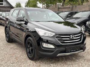 Black Hyundai Santa Fe 2016 in Telschi, with an engine capacity of 2.00 L and mileage of 212 thousand km for 8300 €, photo 4 on AUTOMOTO.COM.LV