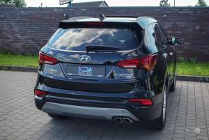 Black Hyundai Santa Fe 2017 in Marijampole, with an engine capacity of 2.20 L and mileage of 193 thousand km for 17350 €, photo 13 on AUTOMOTO.COM.LV