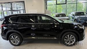 Black Hyundai Santa Fe 2020 in Riga, with an engine capacity of 2.40 L and mileage of 55 thousand km for 24900 €, photo 6 on AUTOMOTO.COM.LV