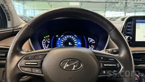 Black Hyundai Santa Fe 2020 in Riga, with an engine capacity of 2.40 L and mileage of 55 thousand km for 24900 €, photo 22 on AUTOMOTO.COM.LV