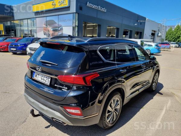 Melns Hyundai Santa Fe 2021 Rīga, ar dzinēja tilpumu 2.40 L un nobraukumu 83 tūkst. km par 23200 €, foto 2 vietnē AUTOMOTO.COM.LV