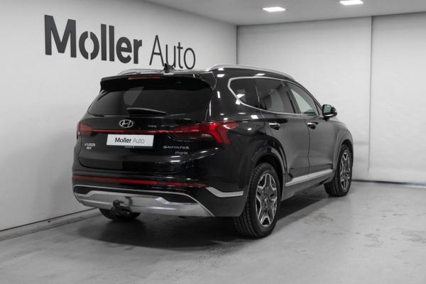 Black Hyundai Santa Fe 2021 in Vilnius, with an engine capacity of 1.60 L and mileage of 133 thousand km for 26900 €, photo 3 on AUTOMOTO.COM.LV